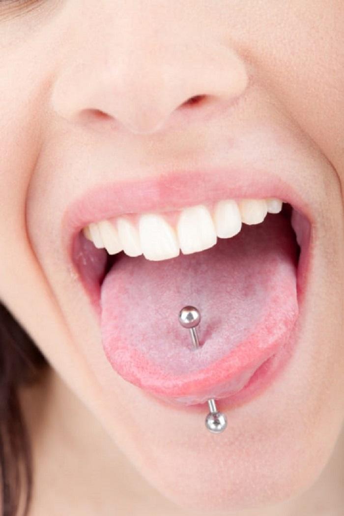 Types, pain, healing: why do women get tongue piercing - Afrinik